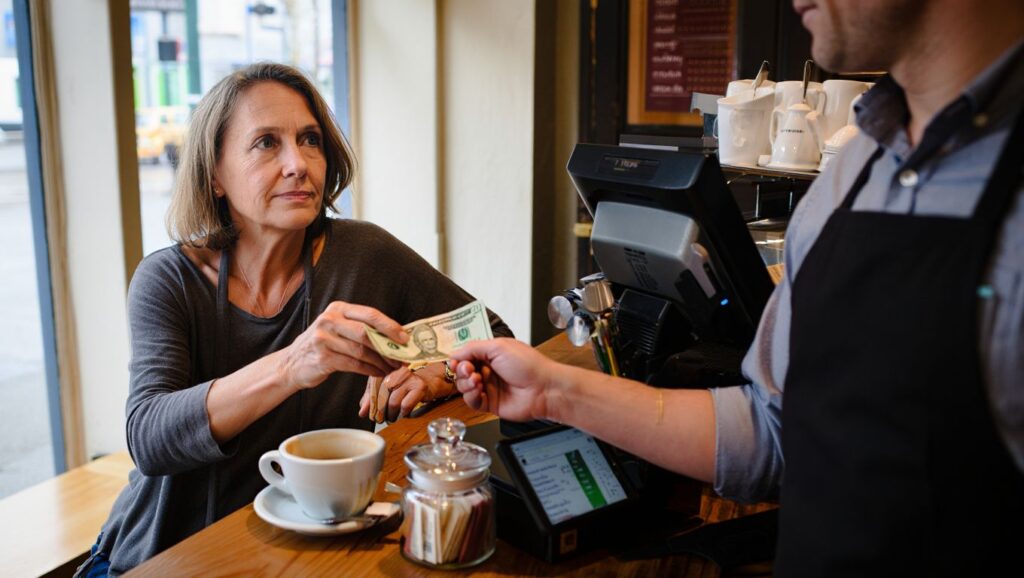 Researchers find that paying with cash instead of cards changes how the ...